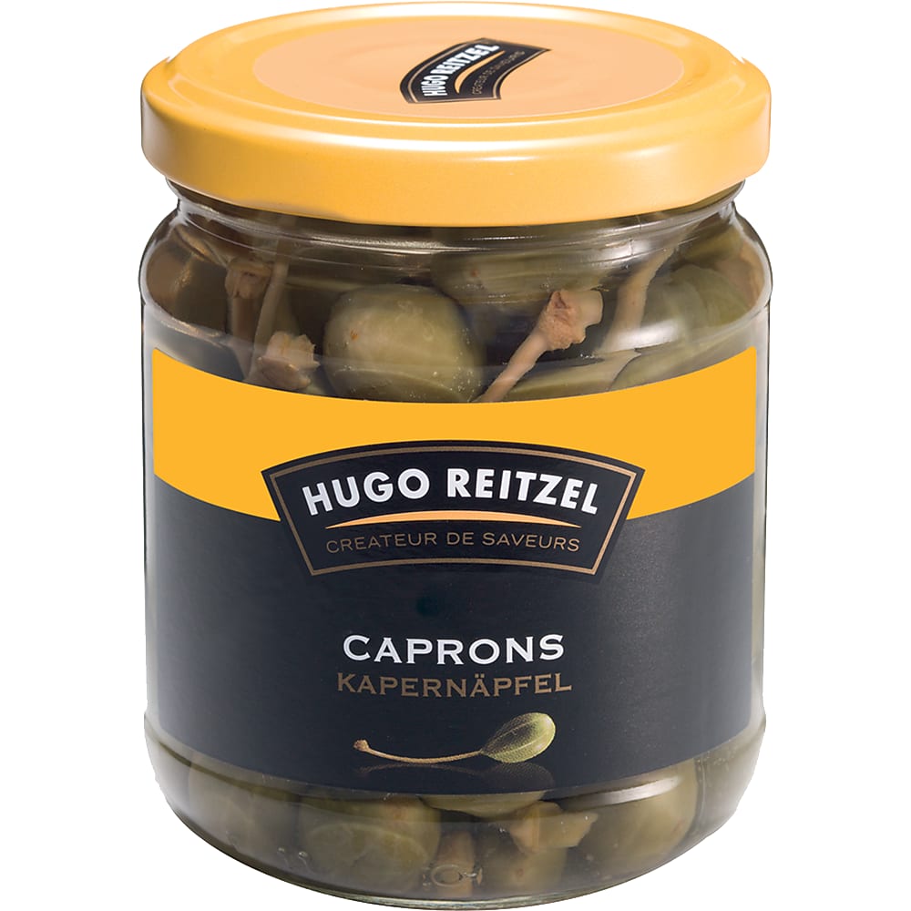 Hugo Reitzel · Caprons • Migros